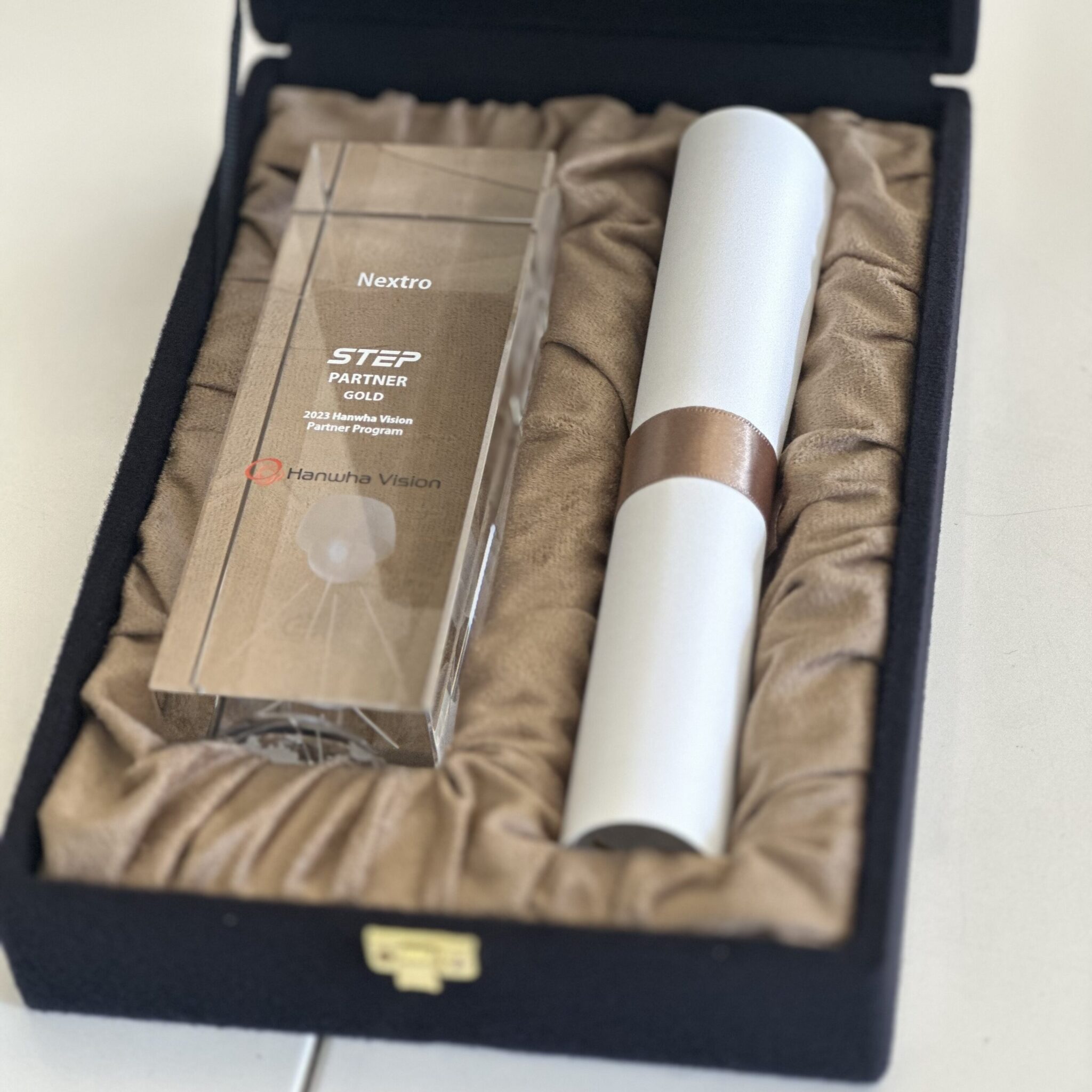 Nextro awarded Hanwha Vision Step Partner Gold Status for 2024. - Nextro